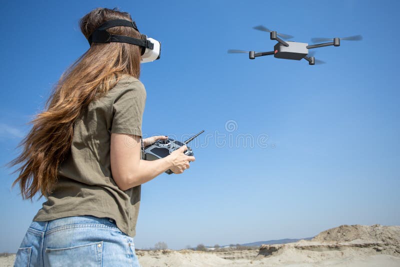 Woman Flying a Drone Wearing VR Goggles Stock Image - Image of ...