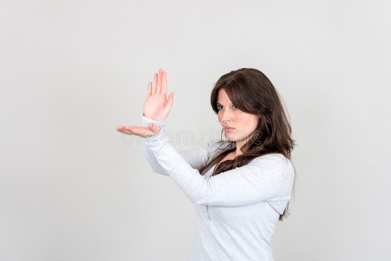 Young Woman Gesturing with Her Hands Stock Photo - Image of pensive ...
