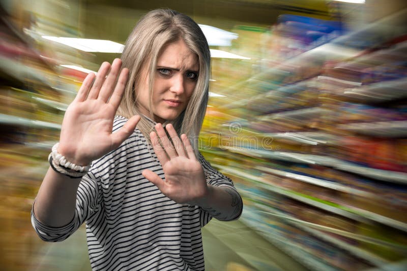 Young woman gesturing stop stock photo. Image of sale - 48359582