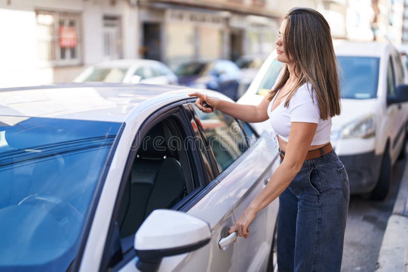 Young Woman Getting in Car at Street Stock Photo - Image of driving ...