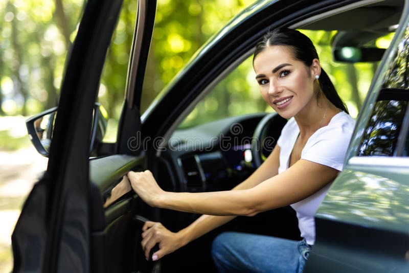 Young Woman Getting Out of Car. Outdoors Stock Image - Image of ...