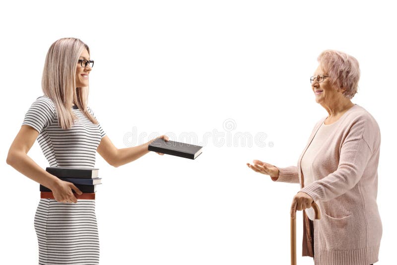 Young Woman Giving a Book To an Elderly Woman Stock Photo - Image of ... Young Woman Giving a Book To an Elderly Woman Stock Photo - Image of ...