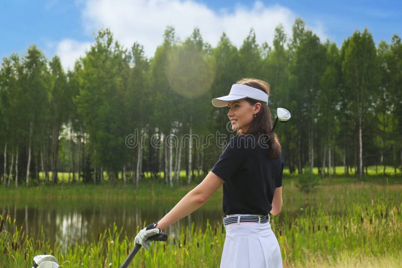 Young Woman on Golf Course, Back View. Stock Image - Image of ...