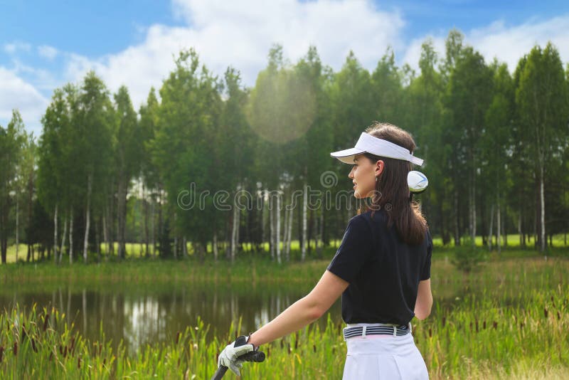 Young Woman on Golf Course, Back View. Stock Image - Image of ...
