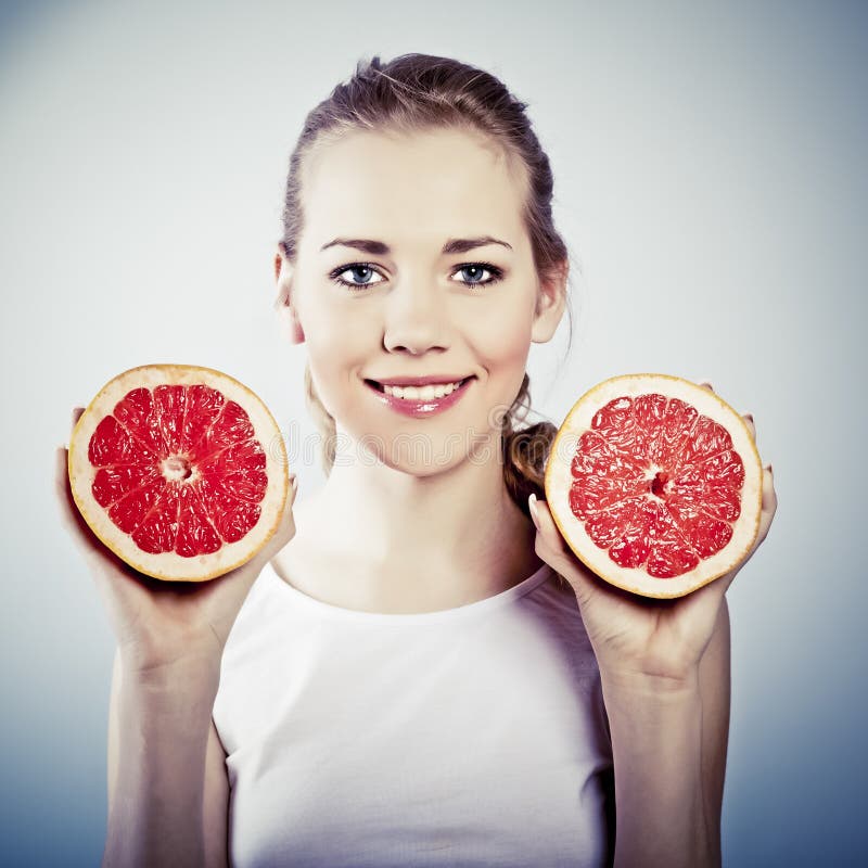 Young Woman with Grapefruit Stock Image - Image of female, braided ...