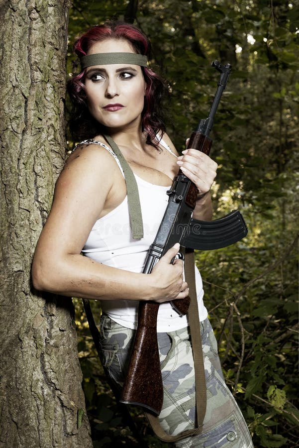 Young woman with gun stock photo. Image of eyes, military - 45206394