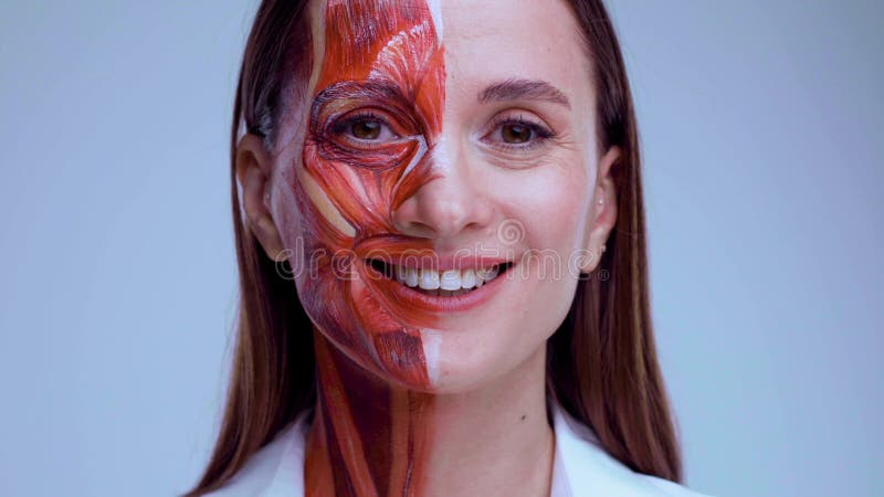 Young Woman with Half of Face with Muscles Structure Under Skin. Model ...