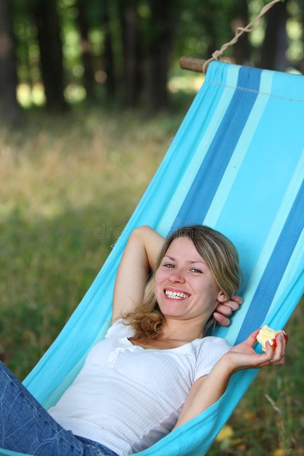 Young woman in a hammock stock photo. Image of relaxation - 30897800
