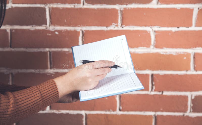Woman hand notepad stock photo. Image of people, handwriting - 172341006