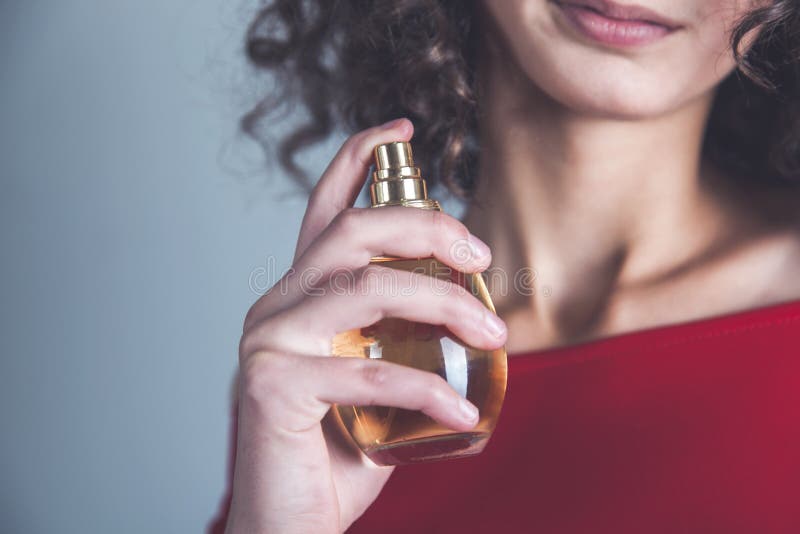 Woman hand perfume stock image. Image of luxury, young - 182047217