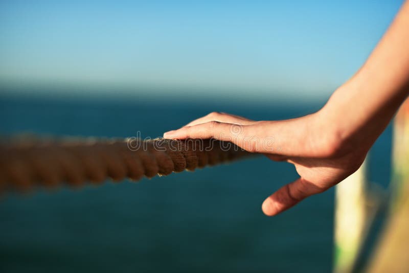 Young Woman Hand Holding Rope on the Bridge, Horizontal Stock Photo ...