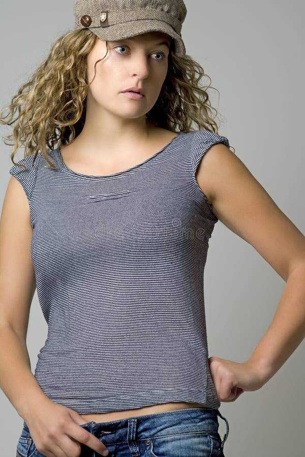 Young Woman in Hat and Stipy Top Stock Image - Image of model, jeans ...