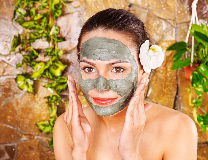 Skin Care. Woman Applying Clay Mud Mask on Face. Stock Photo - Image of ...