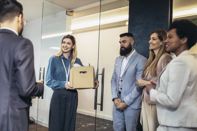Woman Having First Working Day Getting Acquainted with Colleagues Stock ...