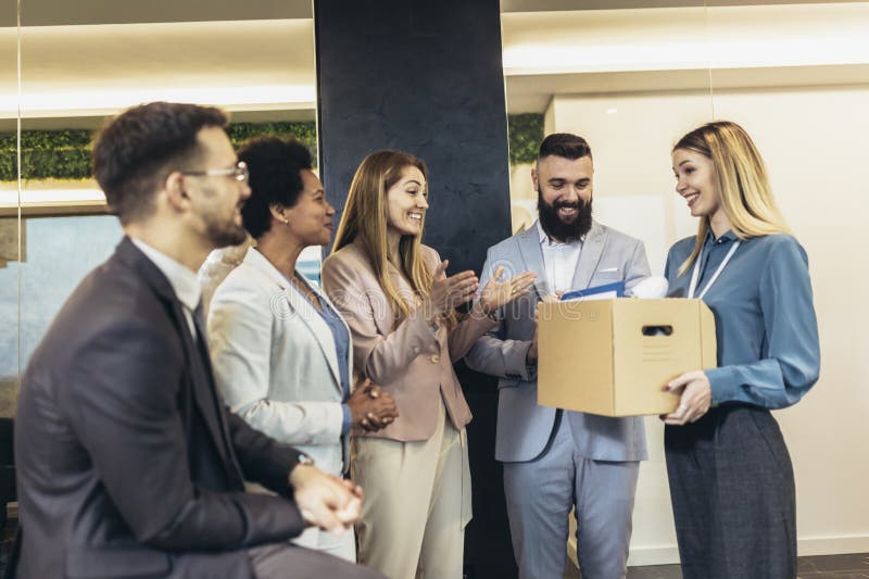 Woman Having First Working Day Getting Acquainted with Colleagues Stock ...