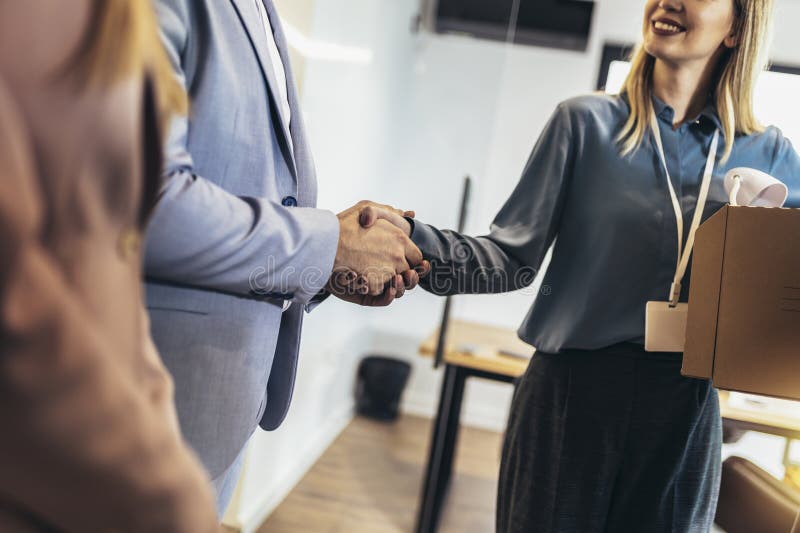 Woman Having First Working Day Getting Acquainted with Colleagues Stock ...