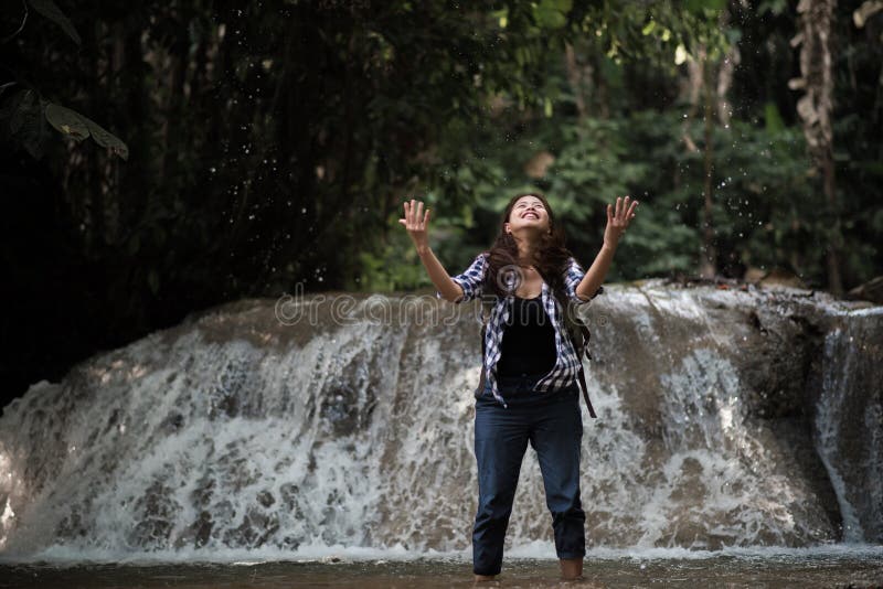 Young Woman Having Fun Under Waterfalls Stock Photo - Image of ...