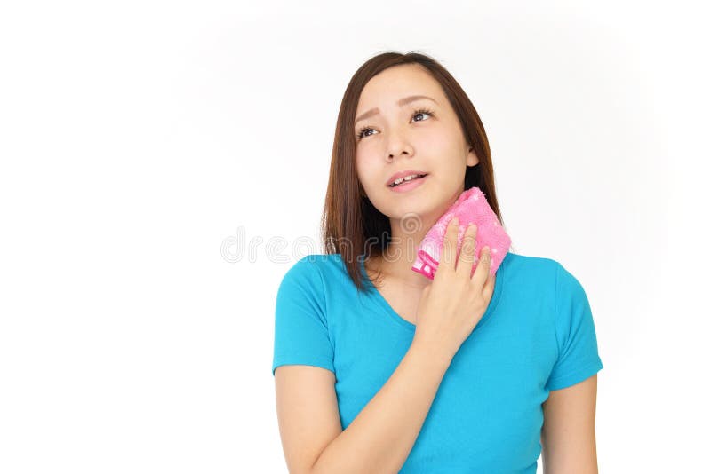 Woman wiping off the sweat stock photo. Image of stroke - 129783886