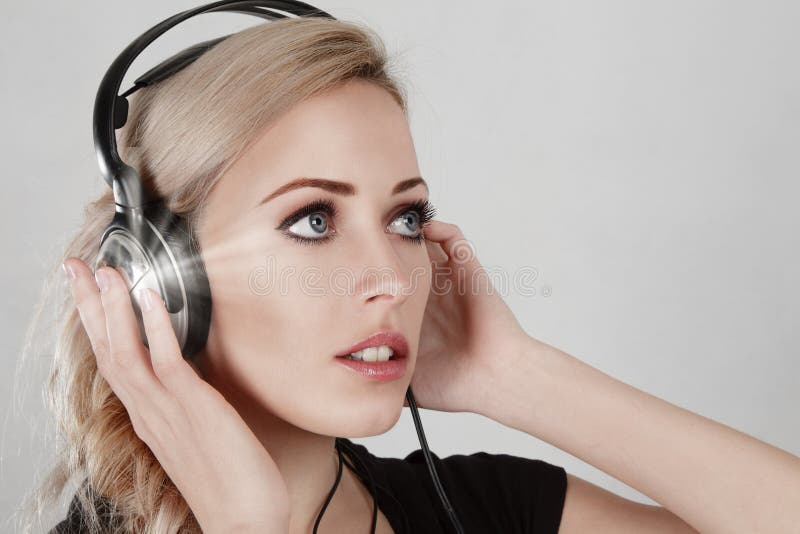 Young woman with headphone stock photo. Image of face - 26926638