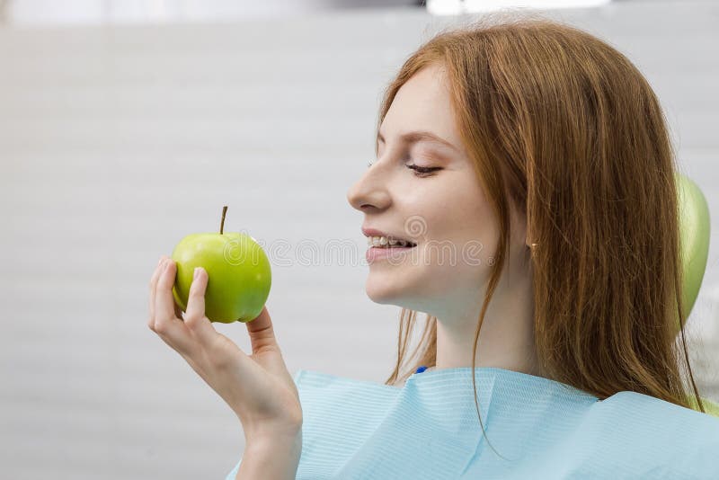 Young Woman with Healthy Tooth Biting Green Apple Stock Image - Image ...