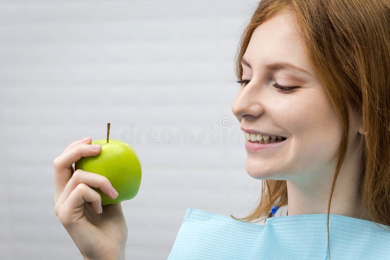 Young Woman with Healthy Tooth Biting Green Apple Stock Image - Image ...
