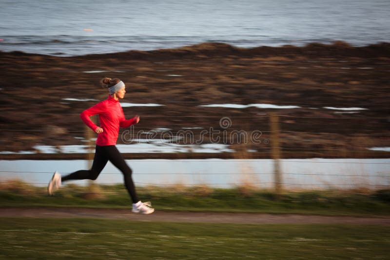 Young Woman on Her Evening Jog Stock Photo - Image of caucasian, energy ...