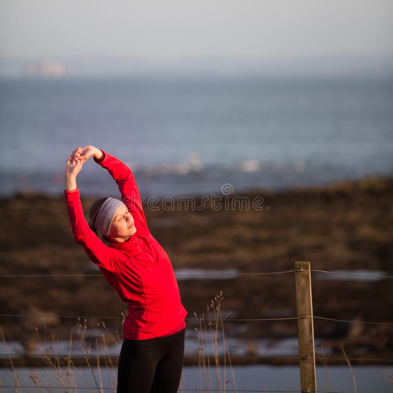 Young Woman on Her Evening Jog Stock Photo - Image of caucasian ...