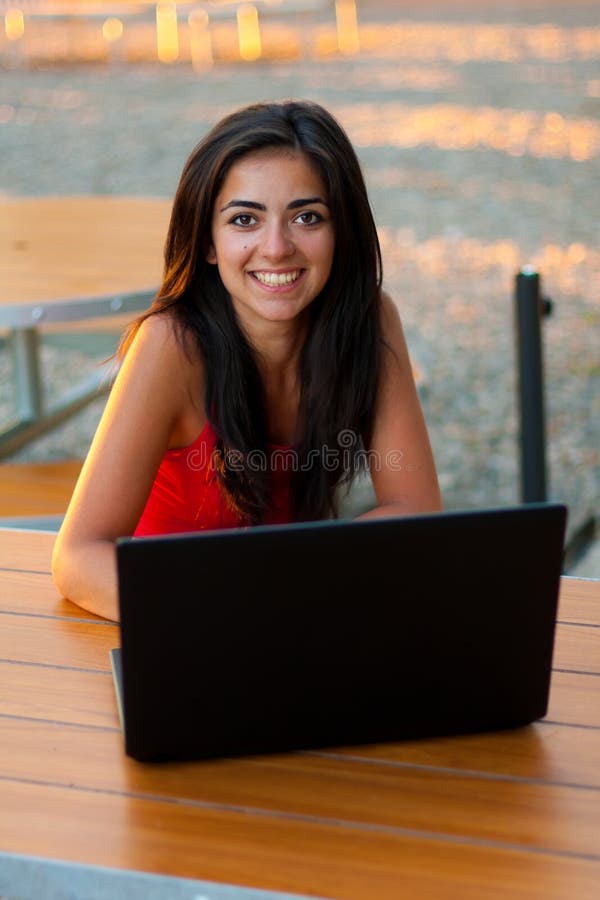 Young Woman with Her Laptop Stock Image - Image of hair, campus: 25457669