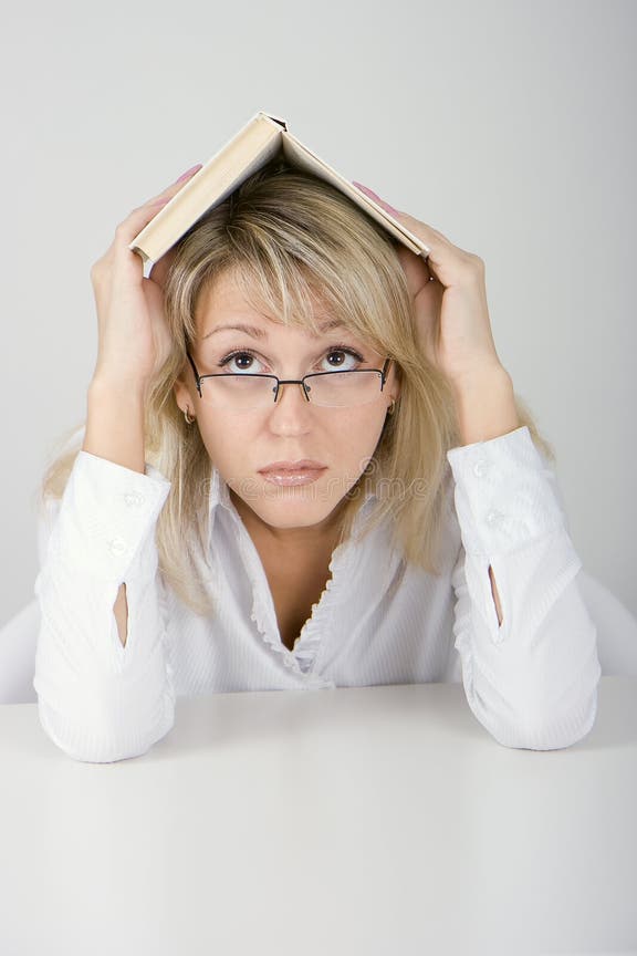 The Young Woman Hides Under the Book Stock Photo - Image of beautiful ...