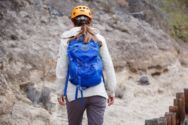 Young Woman Hiking in Mountains with Backpack Stock Image - Image of ...