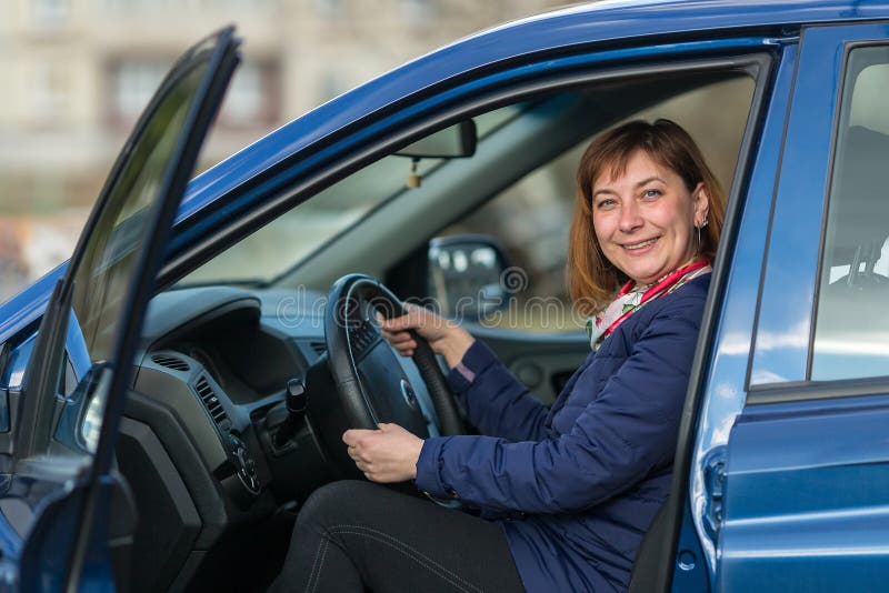 A Young Woman in His New Car. Education. Stock Photo - Image of cute ...