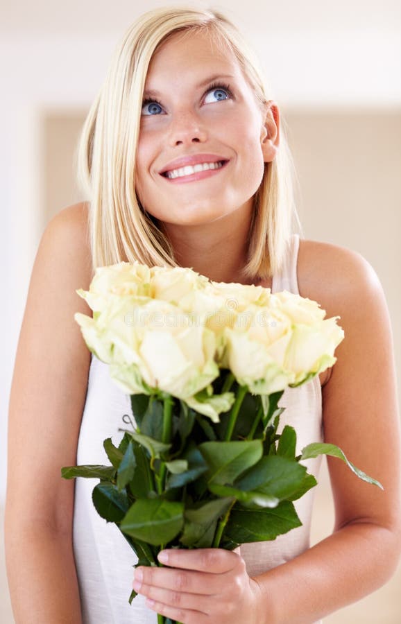 I Love Getting Roses. a Young Woman Holding a Bunch of Roses. Stock ...