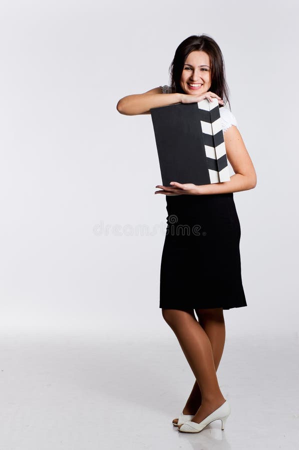 Young Woman Holding a Clapper Stock Image - Image of bollywood, clapper ...