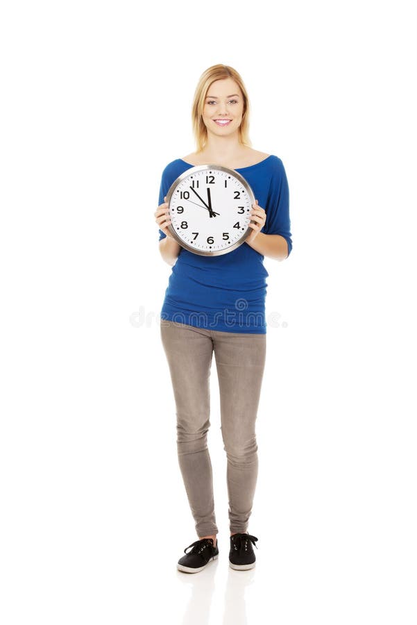 Young Woman Holding a Clock. Stock Image - Image of caucasian, stress ...