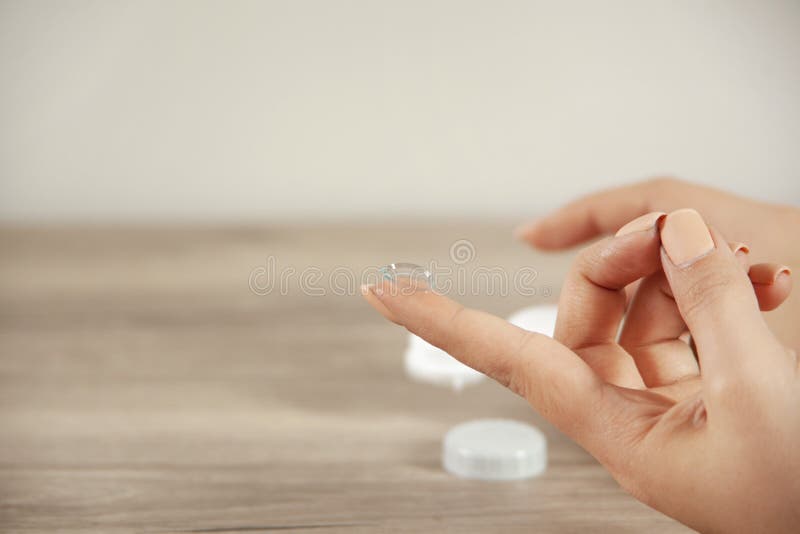Young Woman Holding Contact Lenses Stock Photo - Image of sight, optics ...