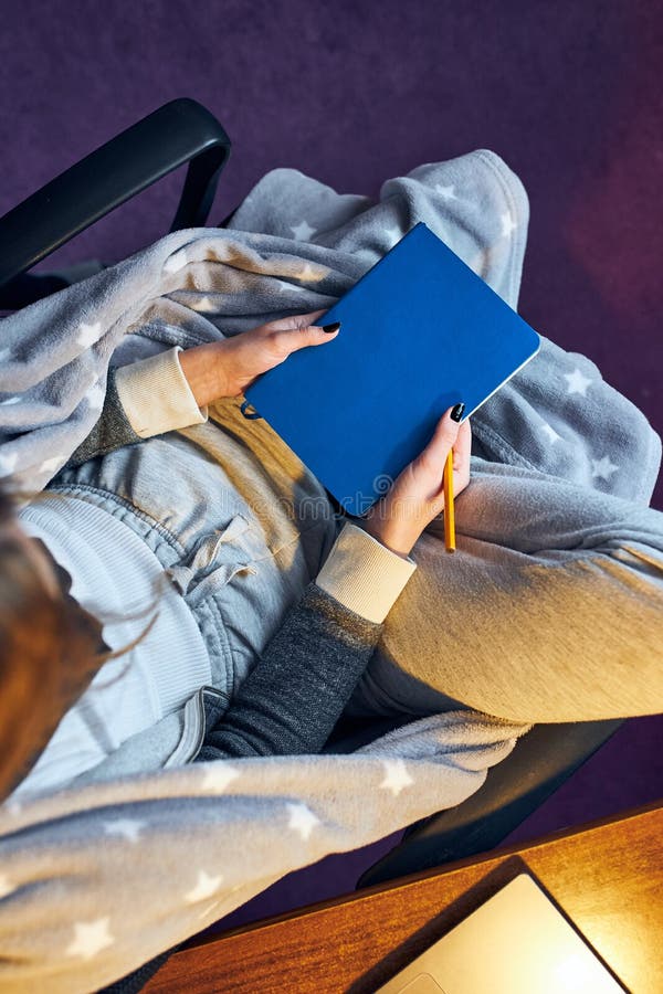 Young Woman Holding Diary, Writing in Journal. Making Notes in Diary ...