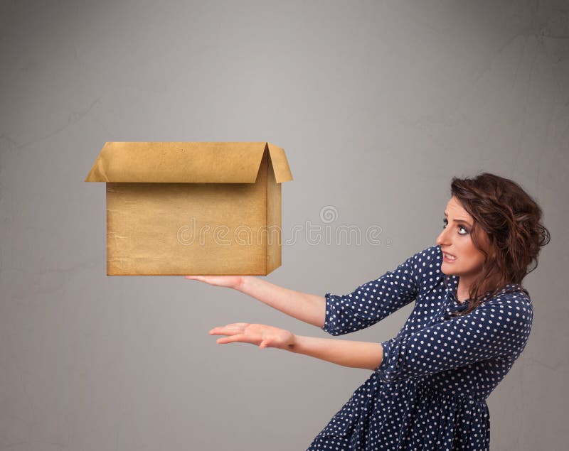 Young Woman Holding an Empty Cardboard Box Stock Photo - Image of open ...