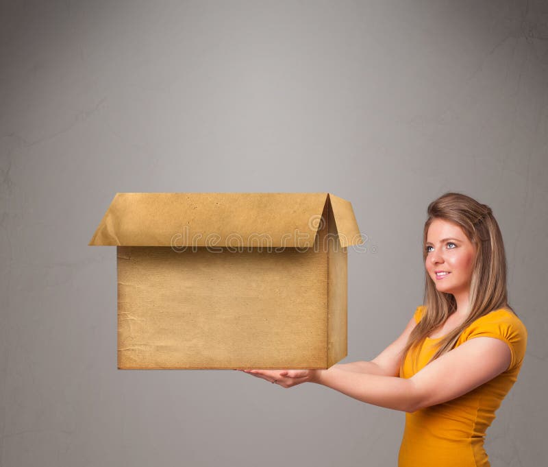 Young Woman Holding an Empty Cardboard Box Stock Photo - Image of open ...