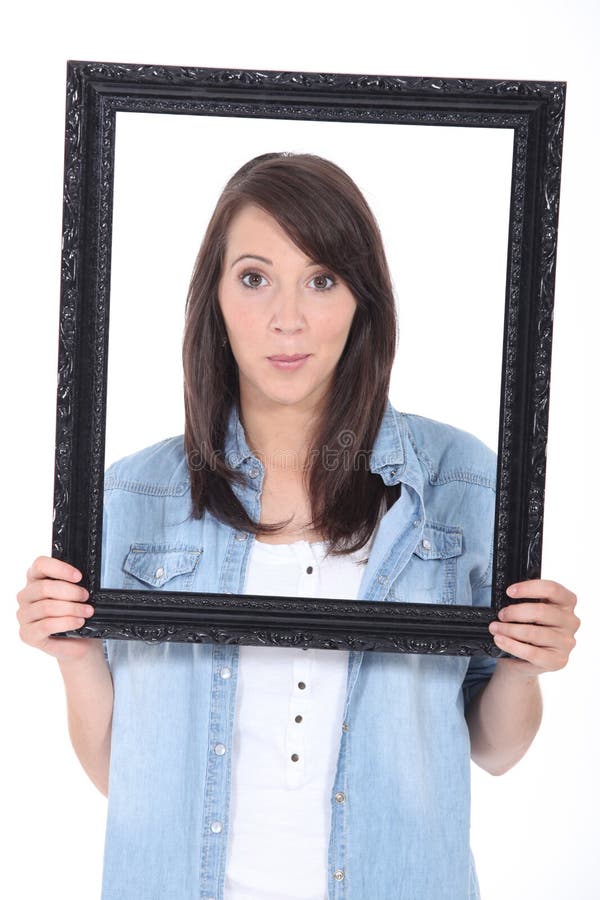 Young Woman Holding a Frame Stock Photo - Image of nice, young: 28641452