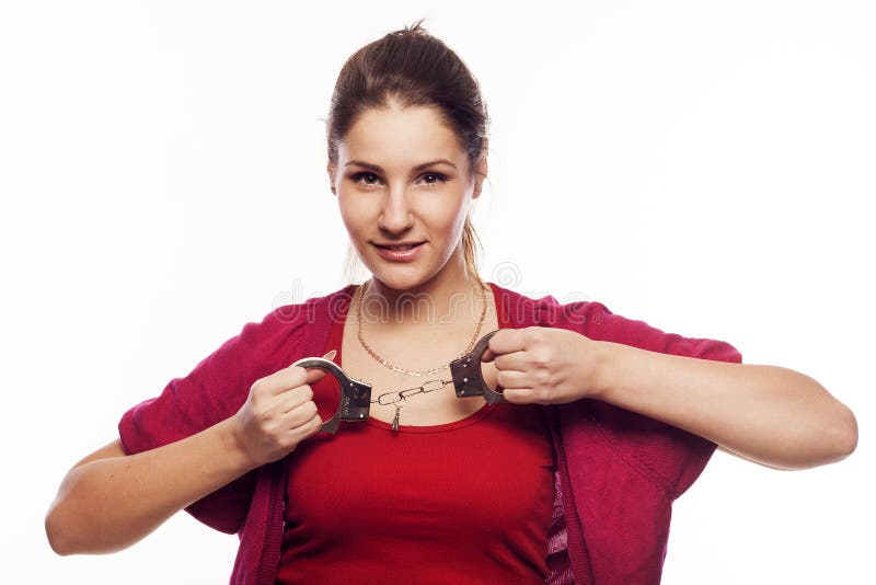 Young Woman Holding Handcuffs Stock Image - Image of girl, young: 50185749