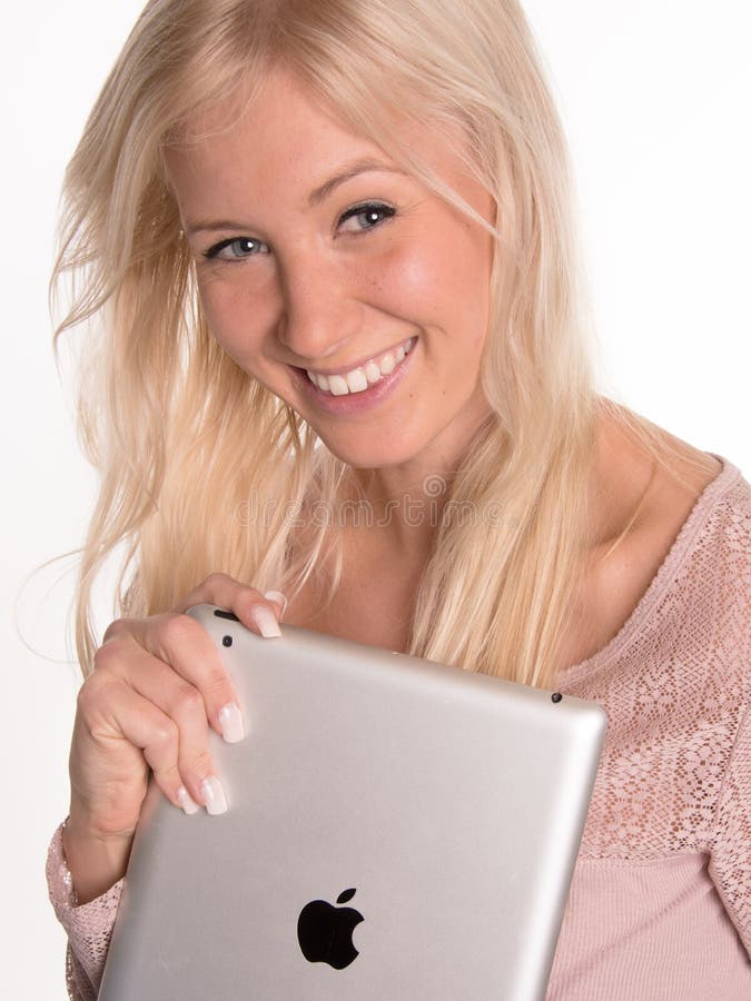 Young woman holding iPad editorial photography. Image of sweater - 38379907