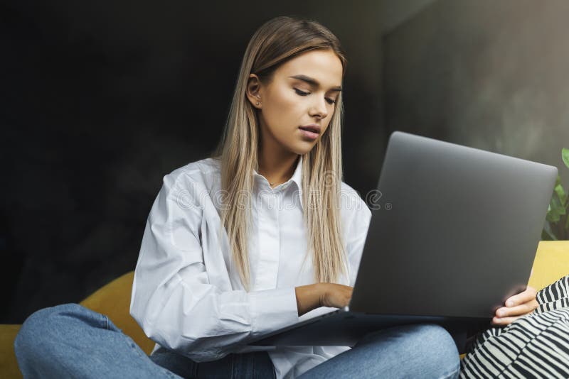 Young Woman Holding Laptop, Surfing Internet, Looking for Useful ...