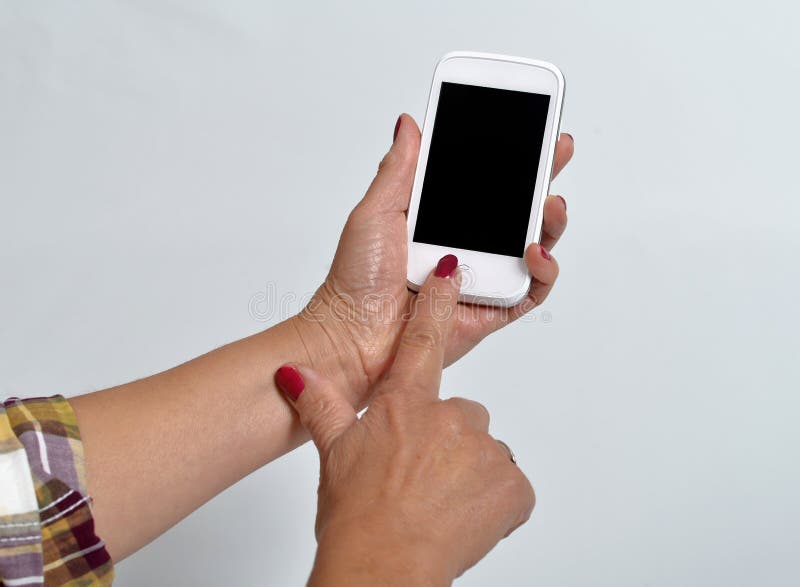 Young Woman Holding a Mobile Phone Stock Photo - Image of phone, phones ...