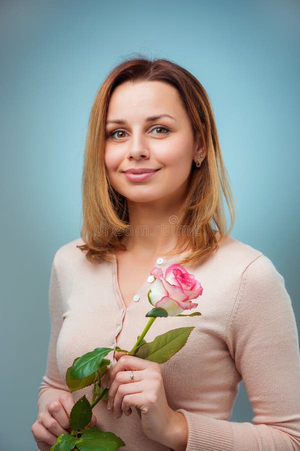 Young Woman Holding Rose and Smiling Stock Image - Image of elegance ...