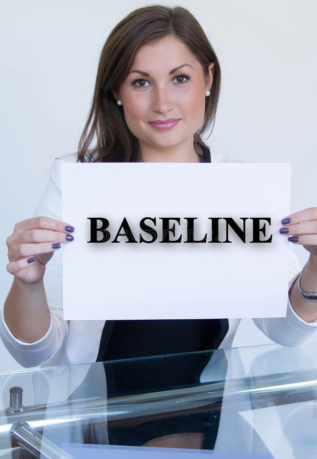 Young Woman Holding a Sheet of Paper with the Text Baseline Stock Image ...