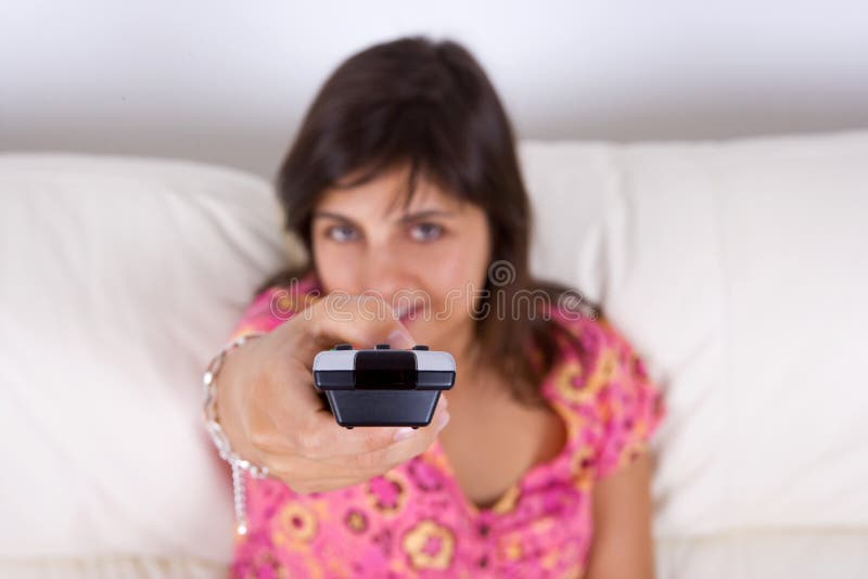 Businesswoman with TV Remote Control Stock Photo - Image of room ...
