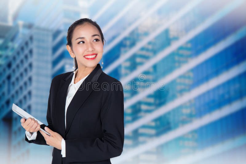 Young Woman Holding Using Touch Pad Tablet Computer, Model is a Asian ...