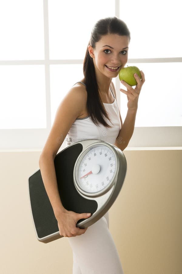 Satisfied Woman Raising Her Scale Stock Photo - Image of bathroom ...