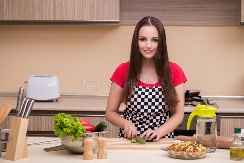 The Young Woman Housewife Working in the Kitchen Stock Image - Image of ...