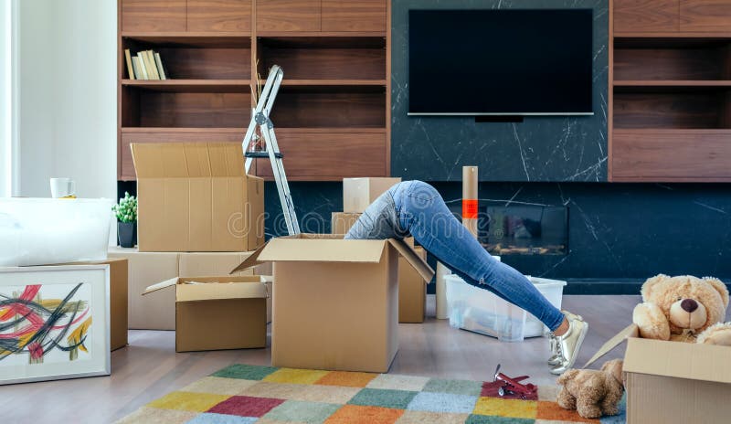 Woman Inside a Box Preparing the Move Stock Image - Image of people ...